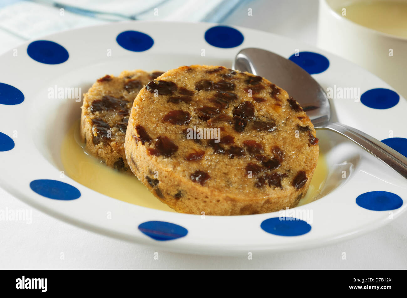 Spotted Dick Steamed fruit pudding Traditional dessert UK Stock Photo ...
