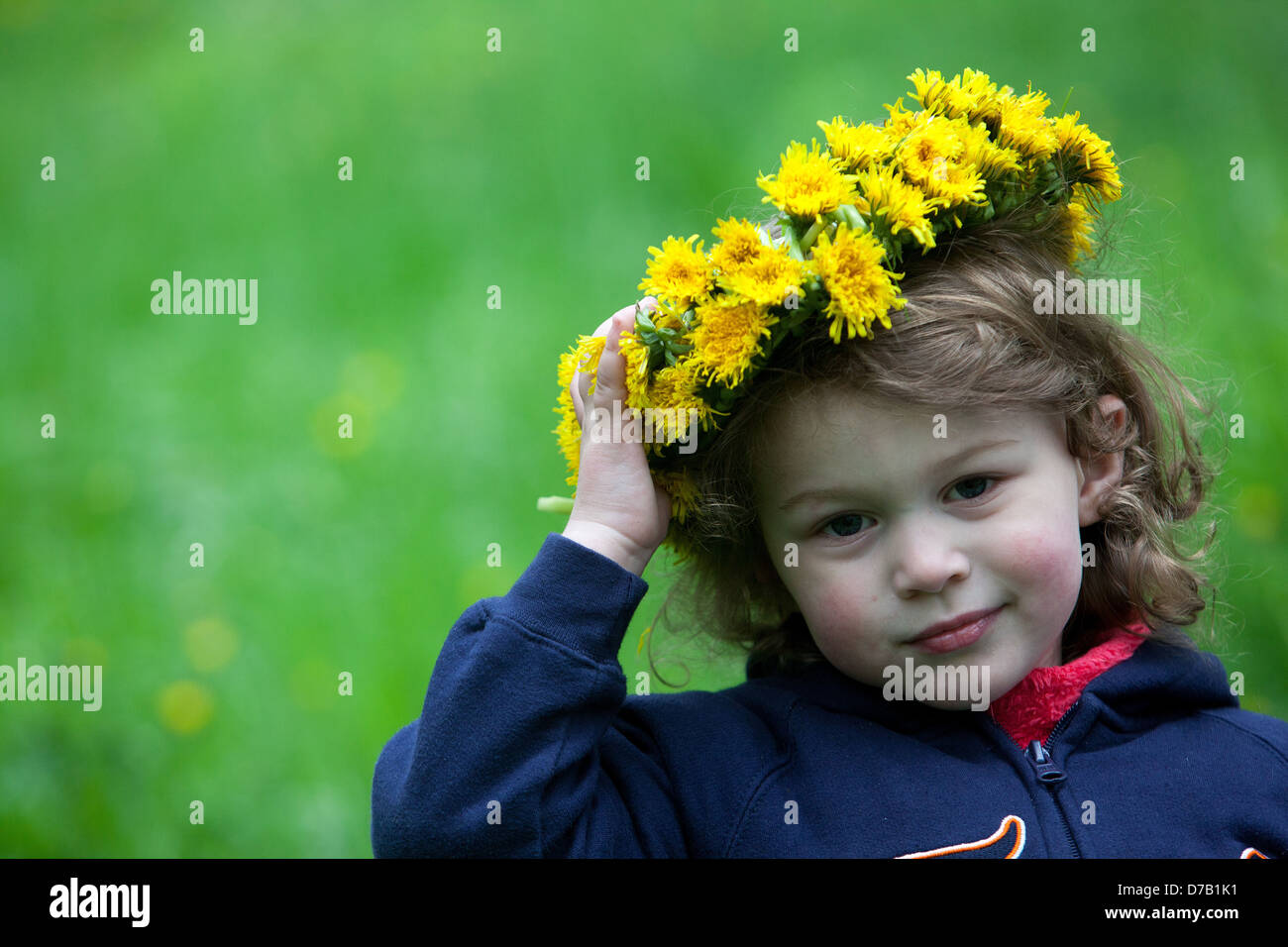 Little girl angel toddler face child with dandelion wreath on head ...
