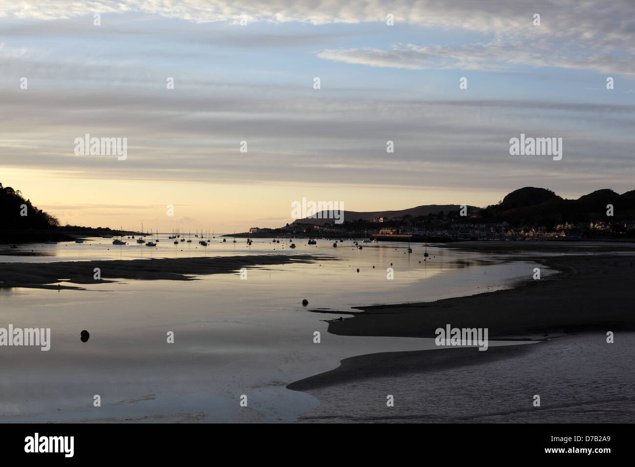 Sunset over the tidal estuary of Conwy Bay, Conwy, North Wales, April ...