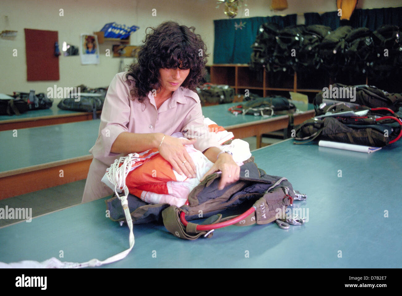 female soldier Packing parachutes Stock Photo - Alamy