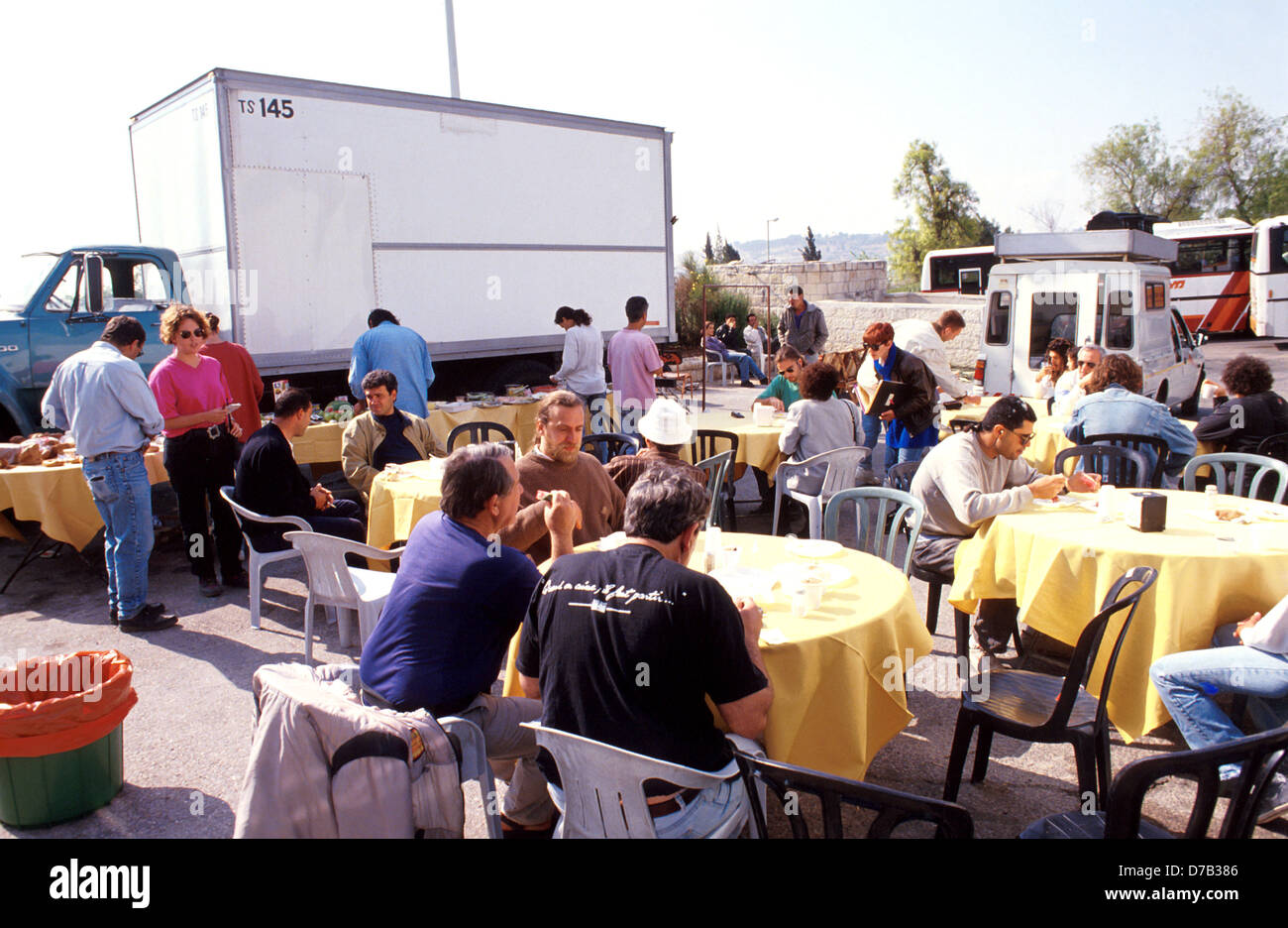 production crew of a movie during a lunch break Stock Photo - Alamy