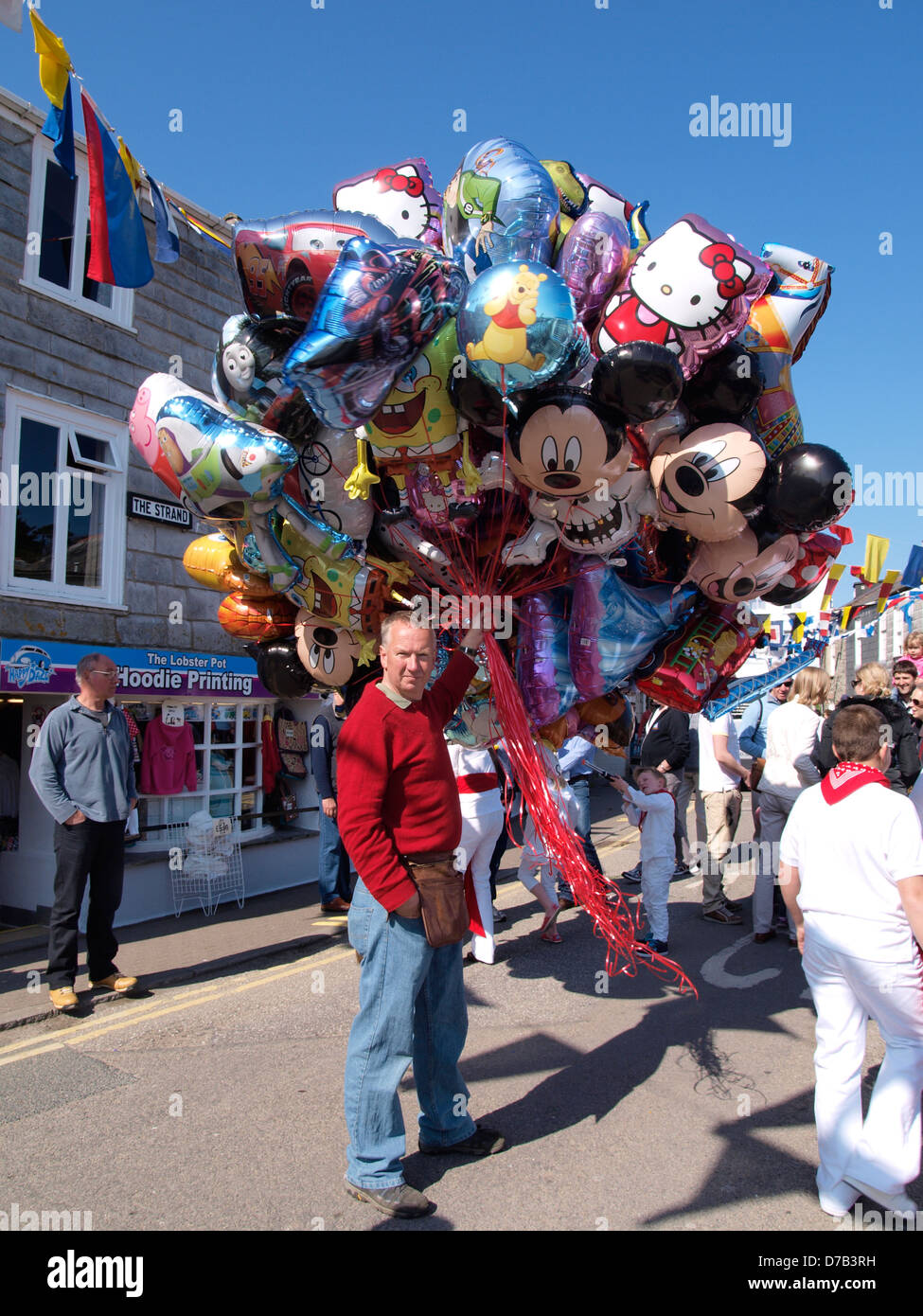 Helium balloon seller hi-res stock photography and images - Alamy