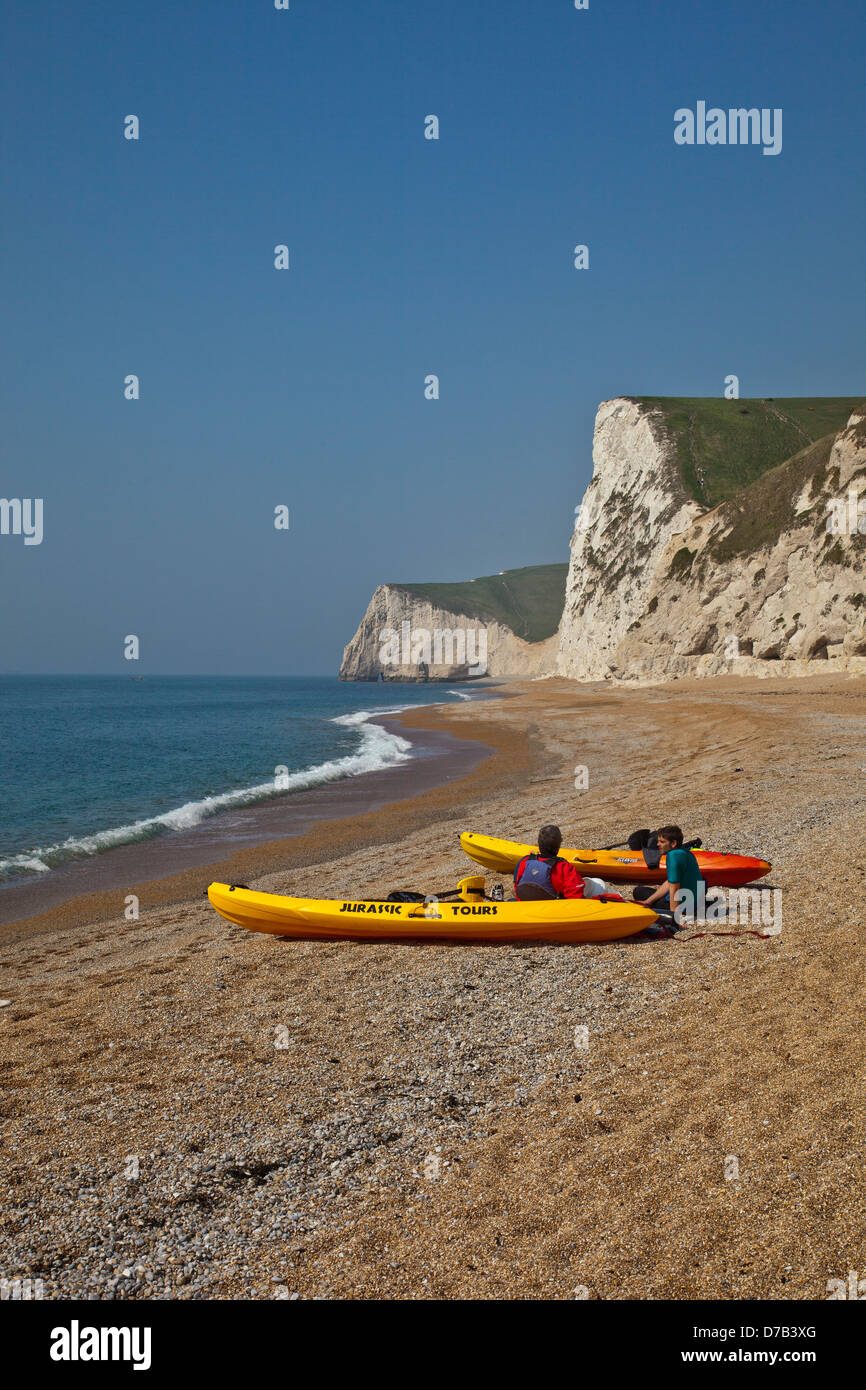 Sea kayaks on the beach at Durdle Door on the SW Heritage Coast, Dorset ...