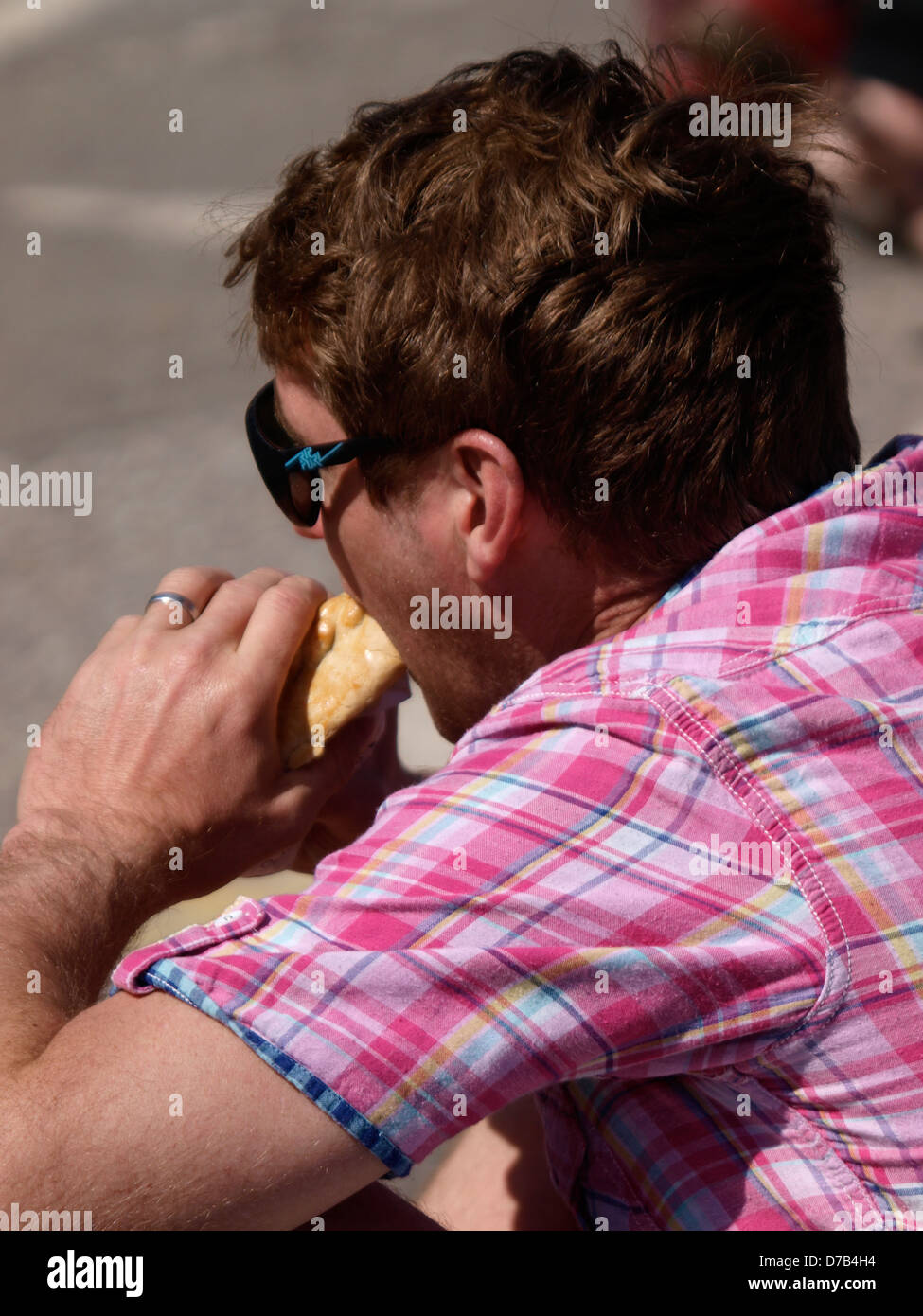 Man eating Cornish Pasty, UK 2013 Stock Photo - Alamy