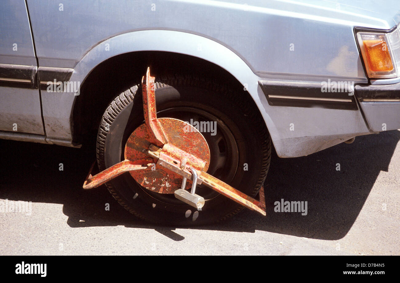 denver sandals that clamp car wheels Stock Photo - Alamy