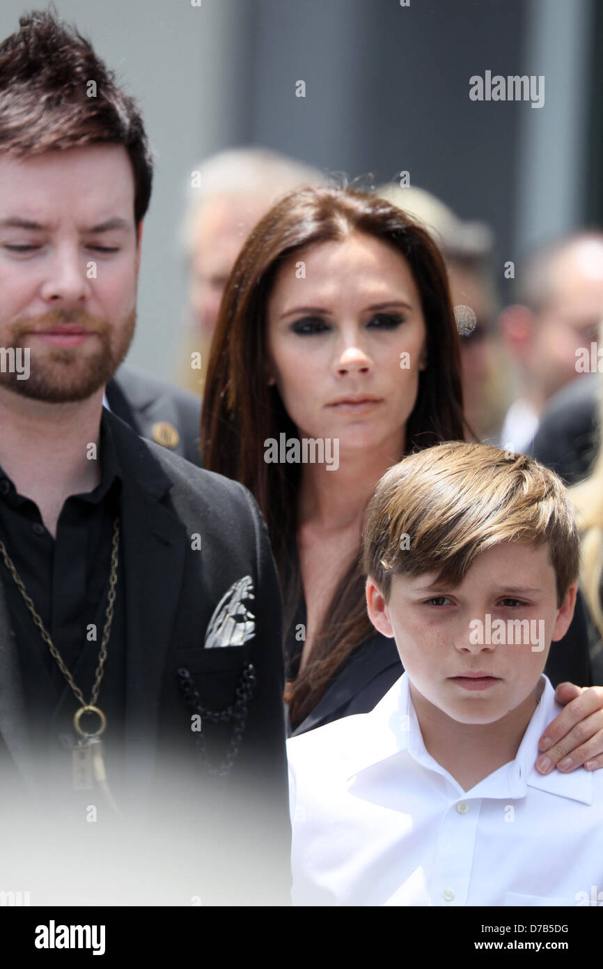 Victoria Beckham and her son Brooklyn Beckham Simon Fuller receives a ...