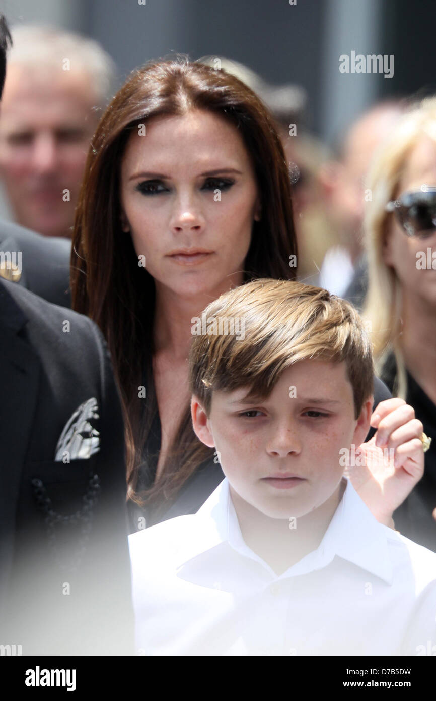 Victoria Beckham and her son Brooklyn Beckham Simon Fuller receives a ...