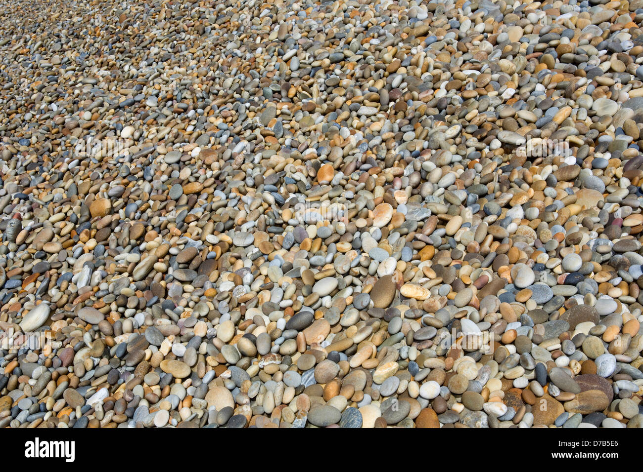 colorful pebble stone background, at the beach Stock Photo - Alamy