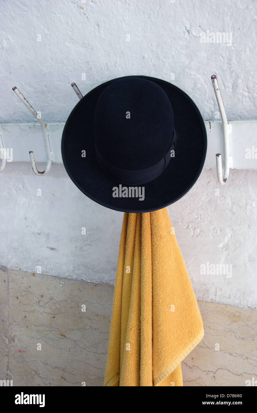 hasidic hat (shtreimel) and towel hanged by mikvah at meron, galilee ...
