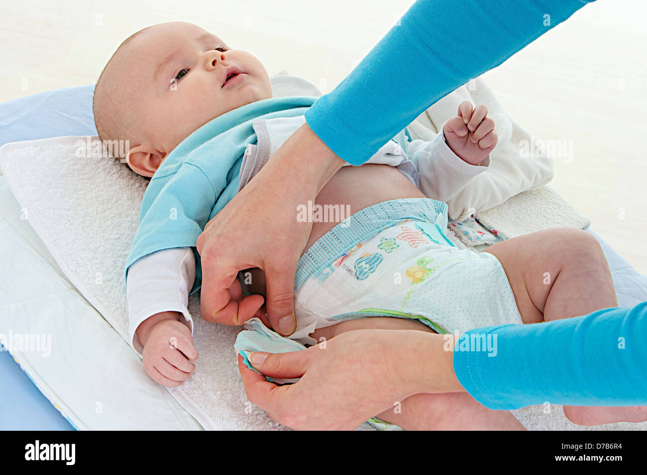 Changing infants diaper hi-res stock photography and images - Alamy