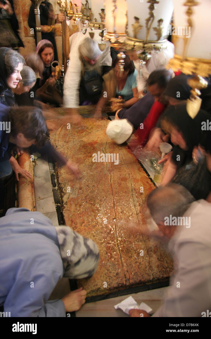pilgrims on good friday by christ tomb at the holy sepulchre ...