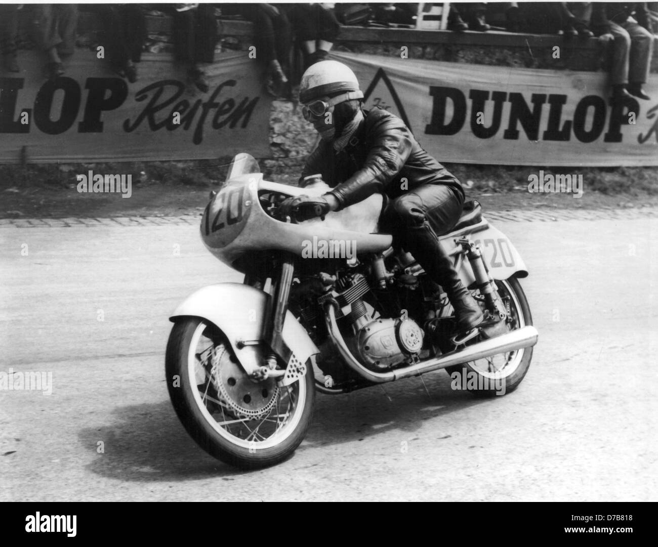 Motorcyclist Werner Haas on his NSU-Rennmax shortly after the start of ...