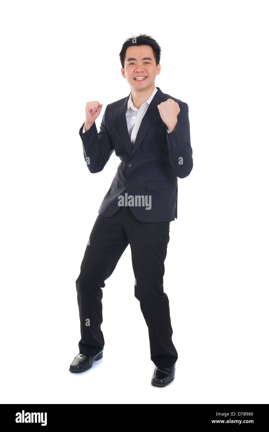 chinese asian business success male jumping in joy with isolated white ...