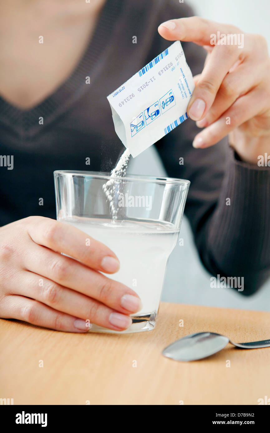 WOMAN TAKING MEDICATION Stock Photo - Alamy