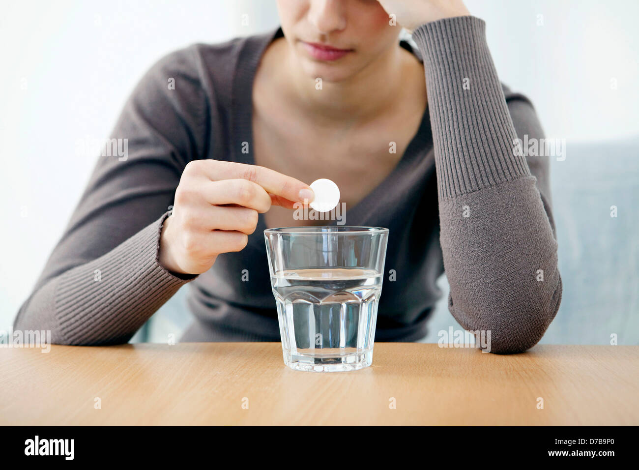 WOMAN TAKING MEDICATION Stock Photo - Alamy