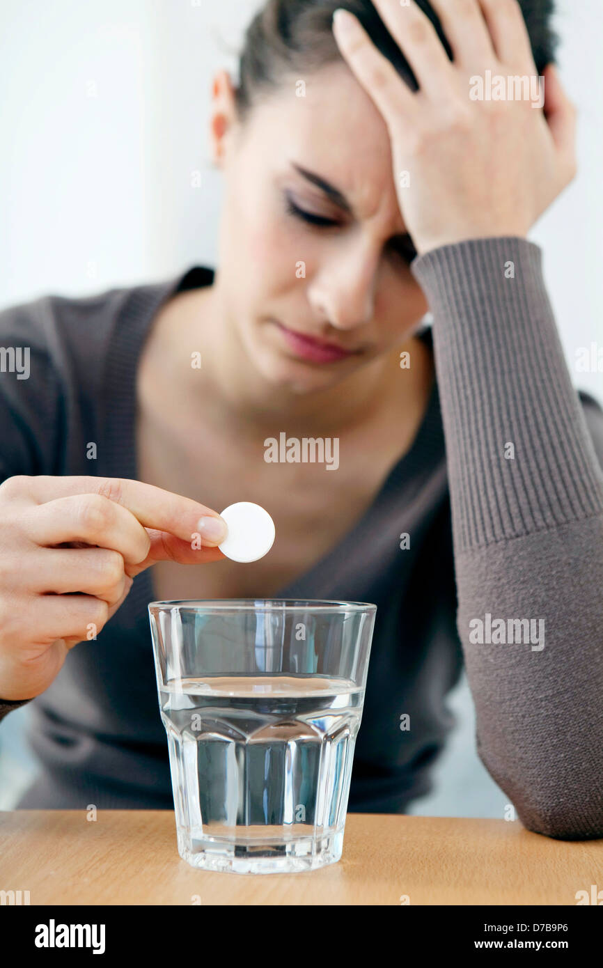 WOMAN TAKING MEDICATION Stock Photo - Alamy