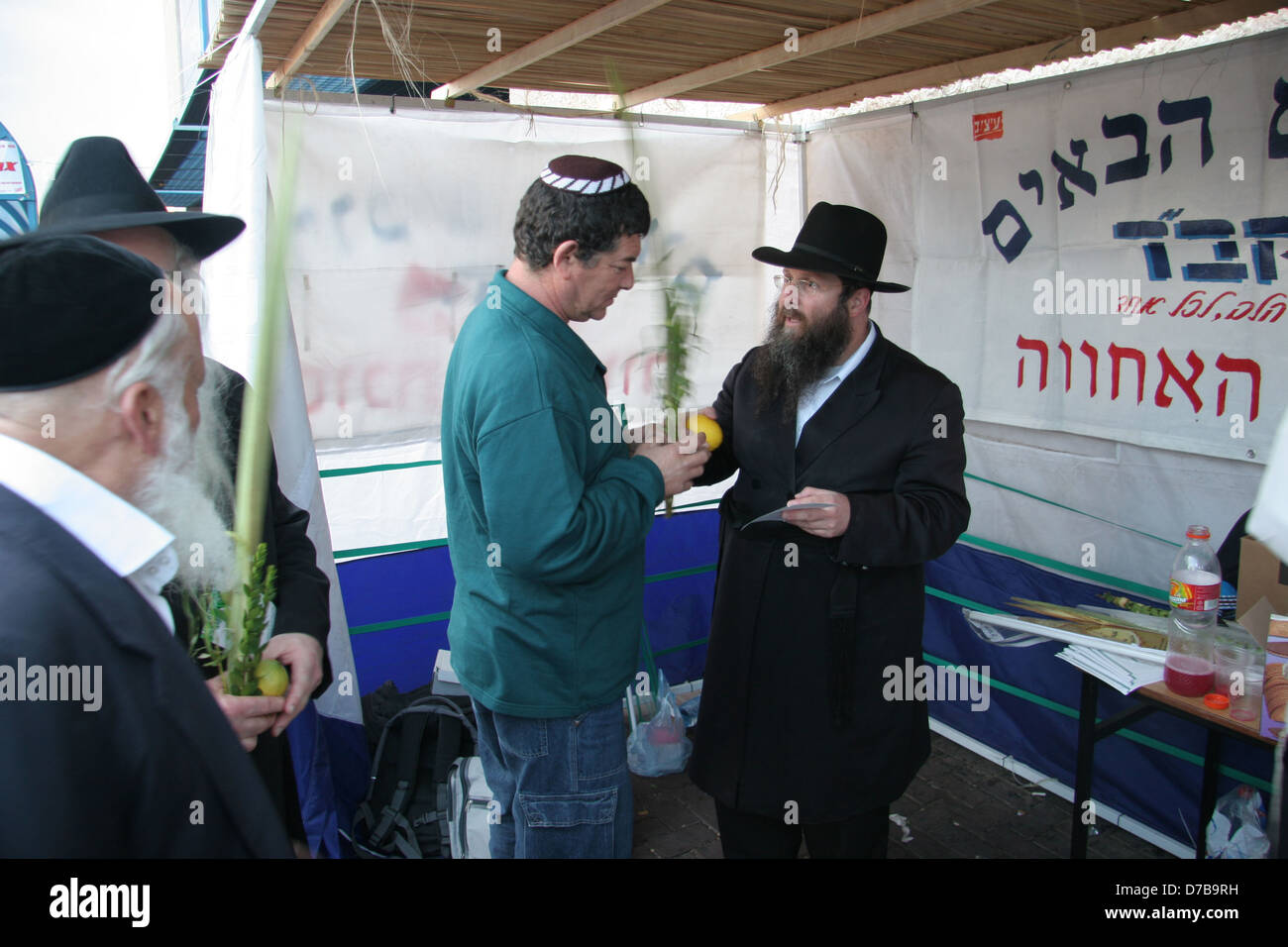 chabad rabbi inviting passerby to bless the four varieties in the ...
