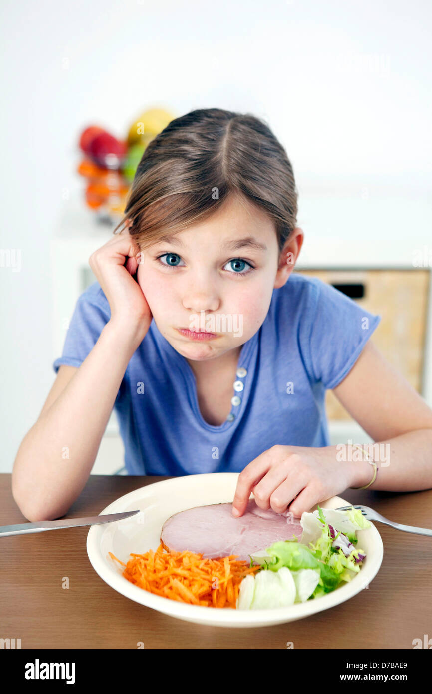 CHILD EATING A MEAL Stock Photo - Alamy