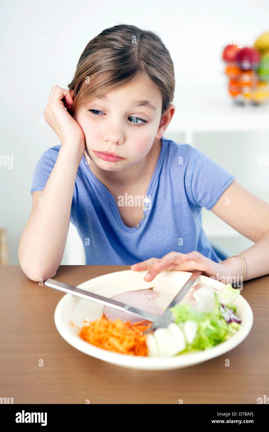 CHILD EATING A MEAL Stock Photo - Alamy