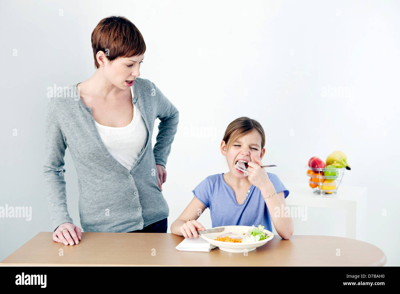 CHILD EATING A MEAL Stock Photo - Alamy