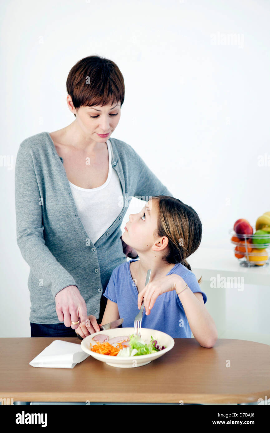 CHILD EATING A MEAL Stock Photo - Alamy