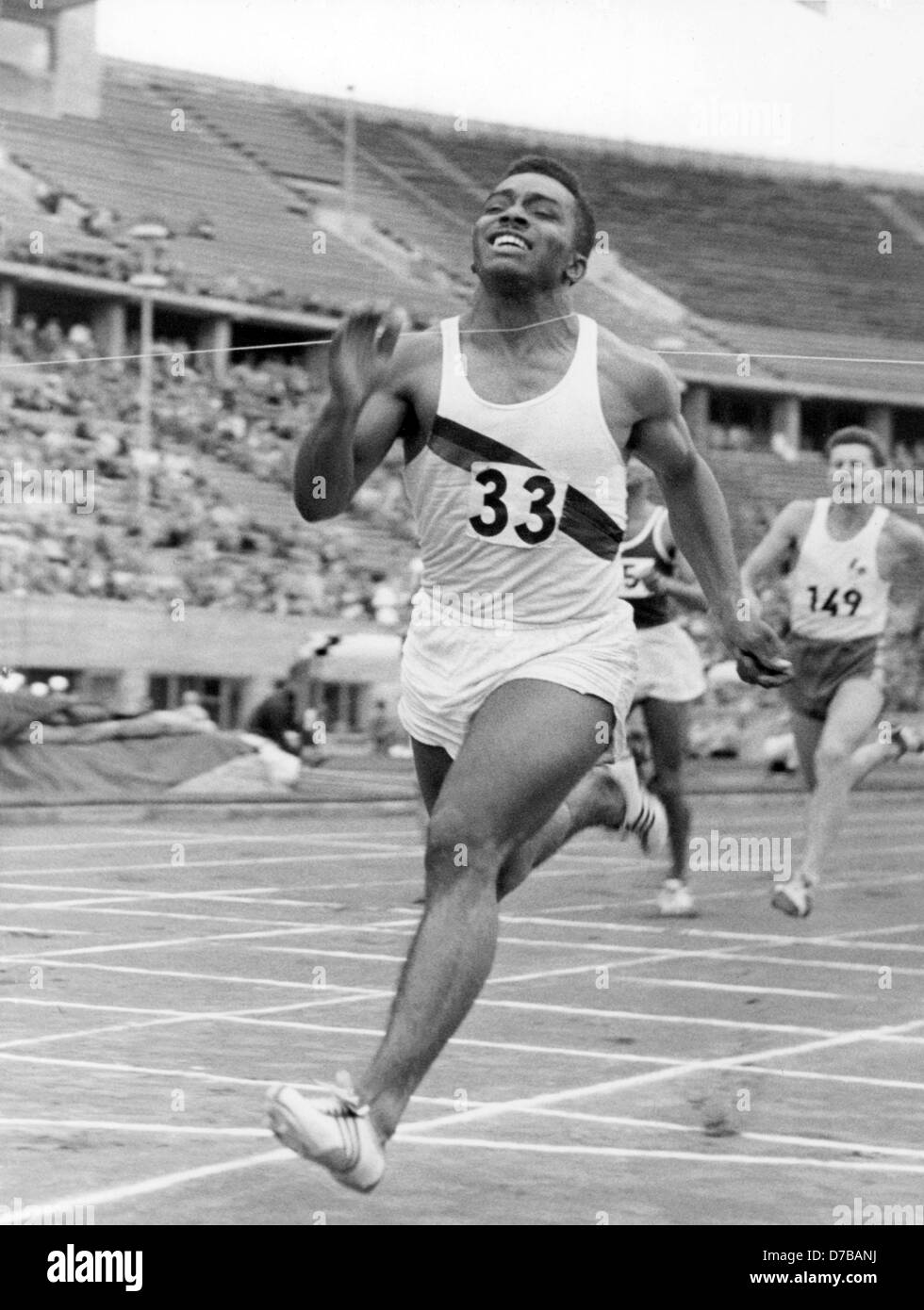 American sprinter Ira Murchison crosses the finish line at the ...
