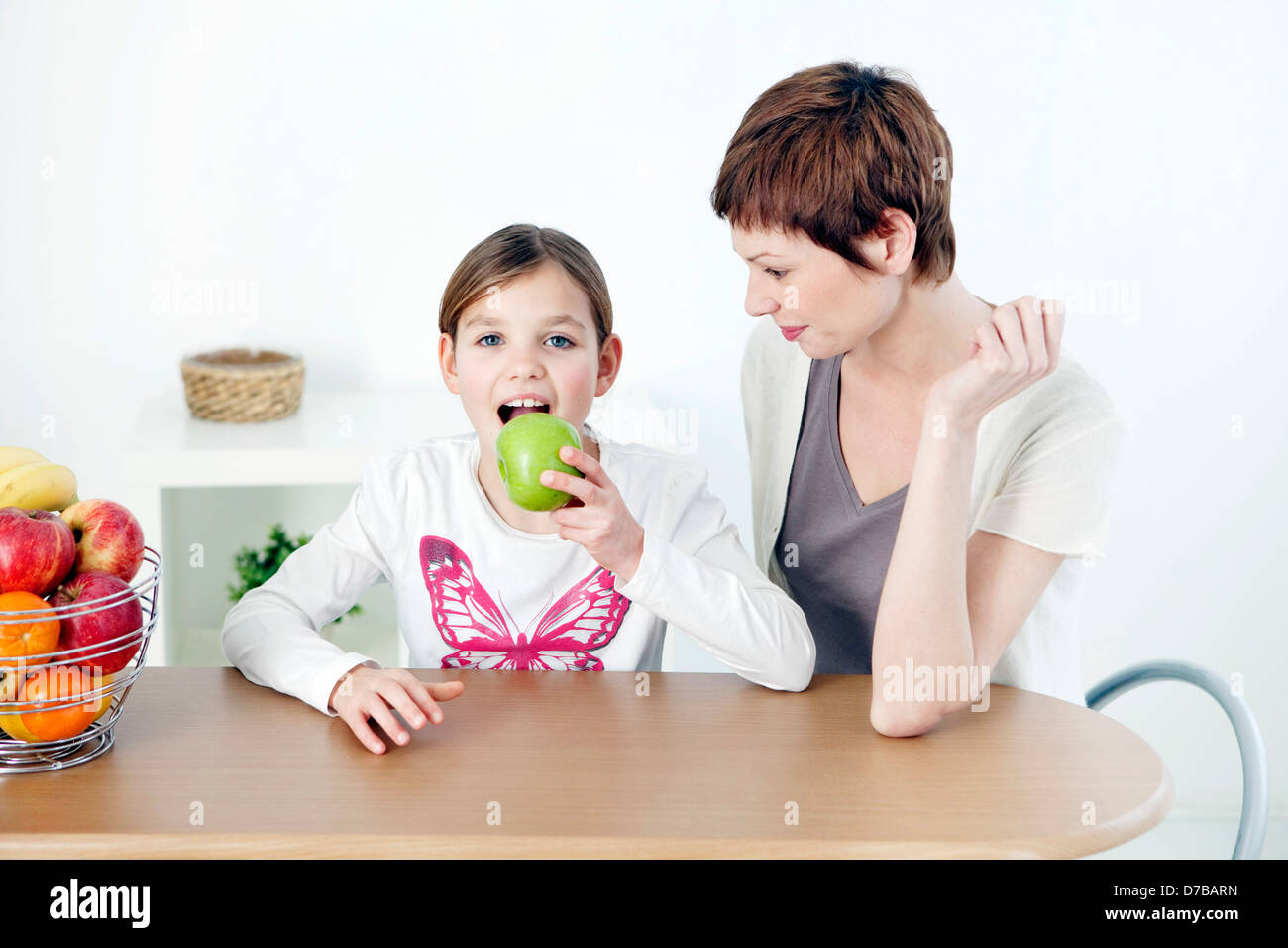 CHILD EATING FRUIT Stock Photo - Alamy