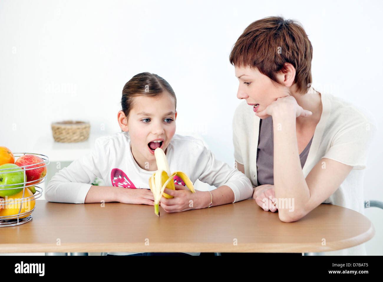 CHILD EATING FRUIT Stock Photo - Alamy