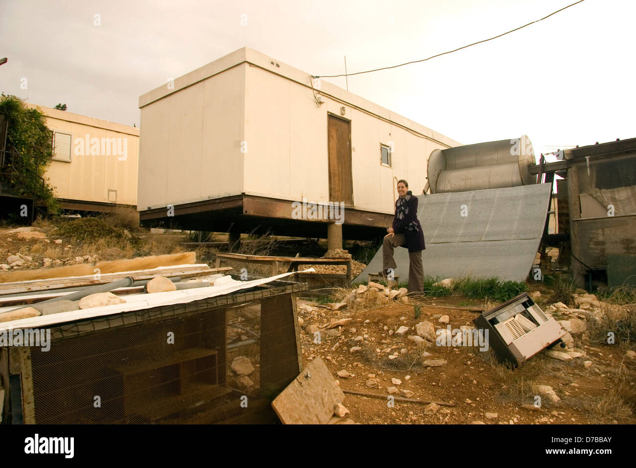 New settler by her mobile home in Kfar Eldad Stock Photo - Alamy