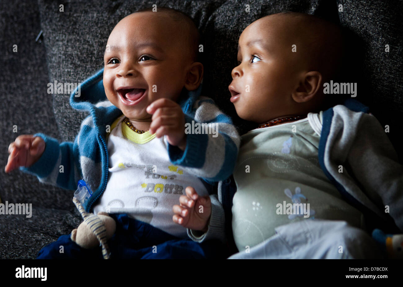 Twins laugh hi-res stock photography and images - Alamy