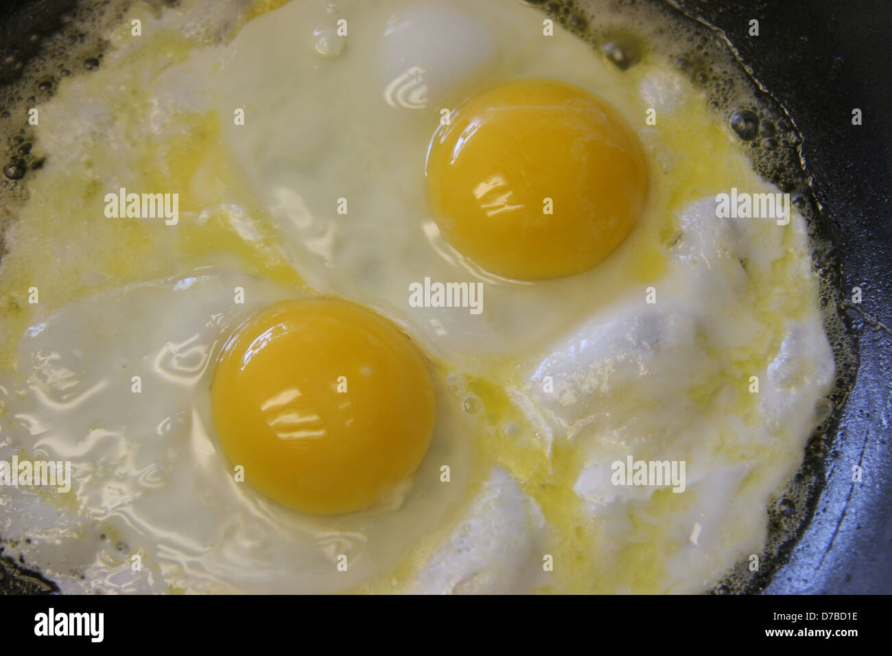 Eggs Cooked Sunny-side Up Stock Photo - Alamy
