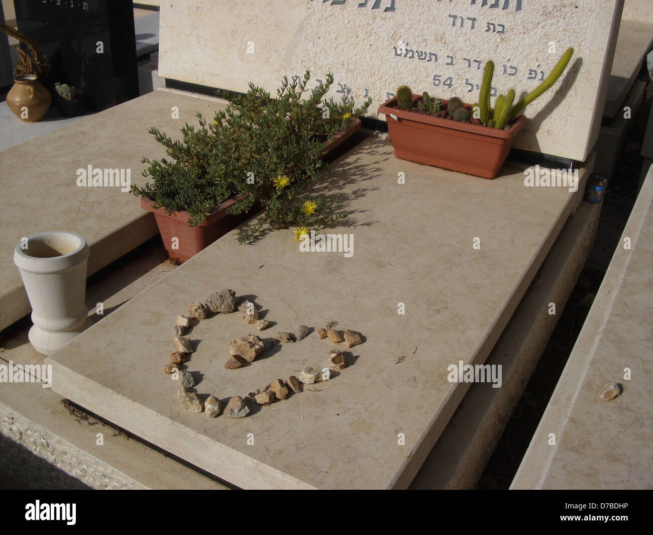 tomb with symbolic mourning stones Stock Photo - Alamy