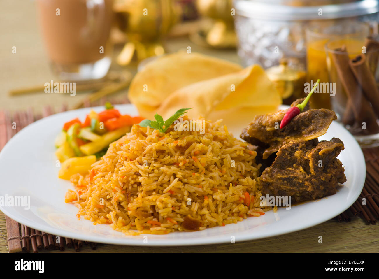 Biryani mutton rice papadam with traditional background Stock Photo - Alamy