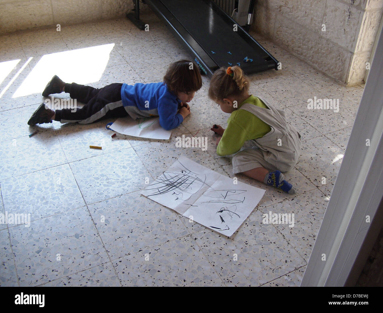 two kids at play Stock Photo - Alamy