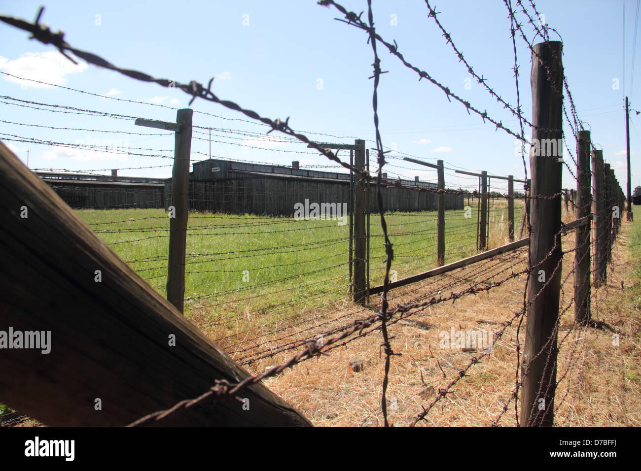 Barbed wired fence surrounding prisoners' barracks at Majdanek death ...