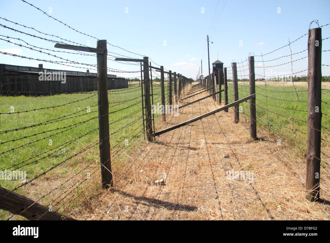 Barbed wired fence surrounding prisoners' barracks at Majdanek death ...