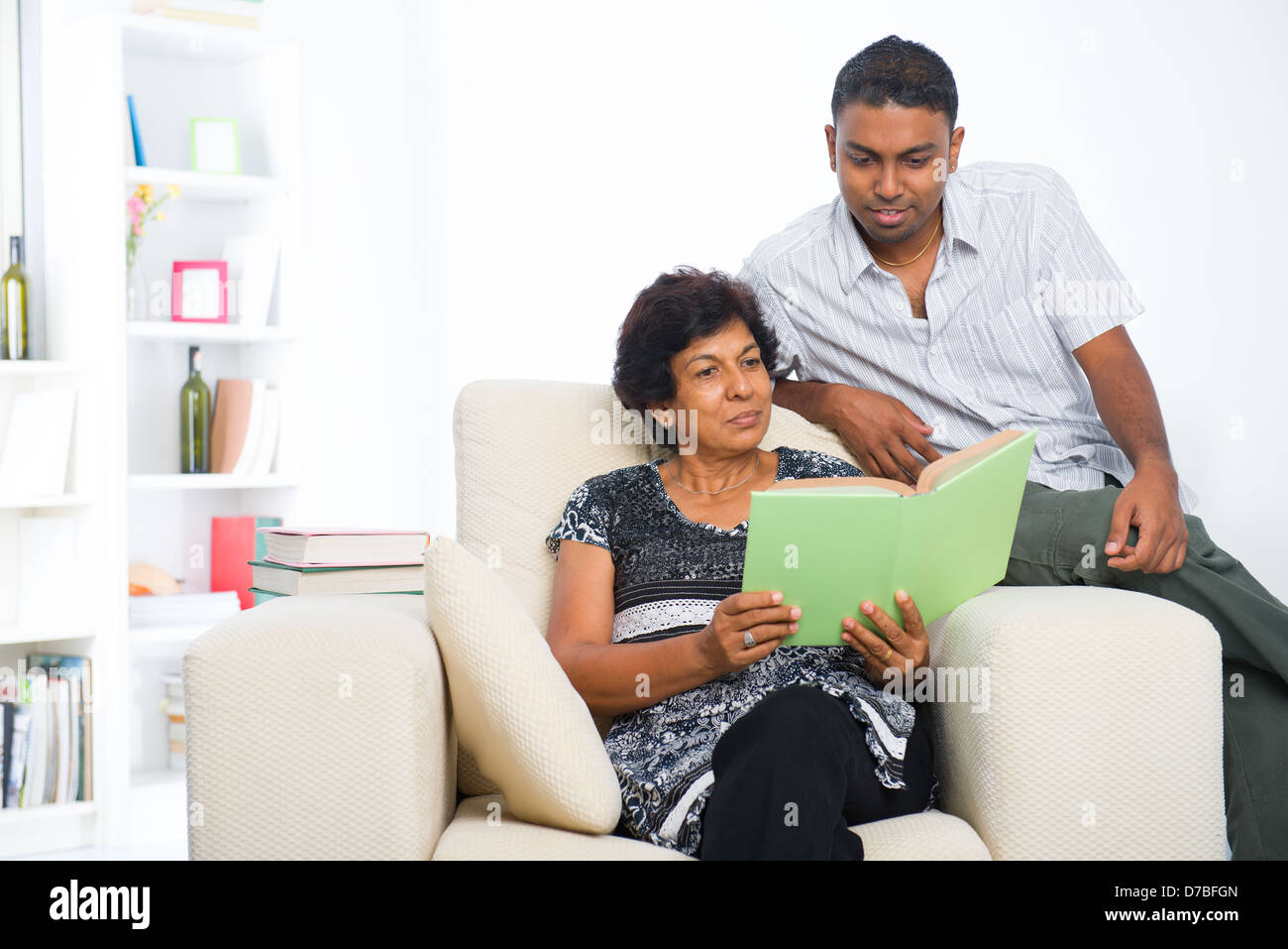 indian family reading lifestyle photo Stock Photo - Alamy