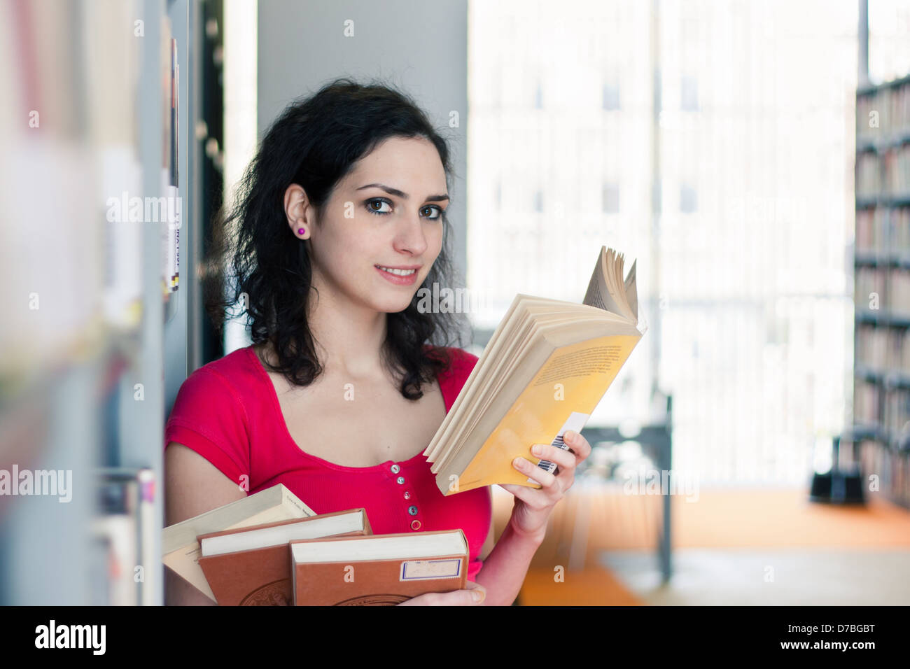 Potrait of a college student in a library Stock Photo - Alamy