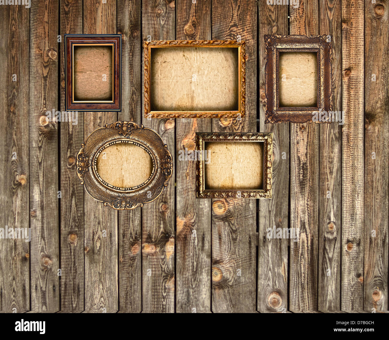 Set of empty picture frames on wooden wall Stock Photo - Alamy