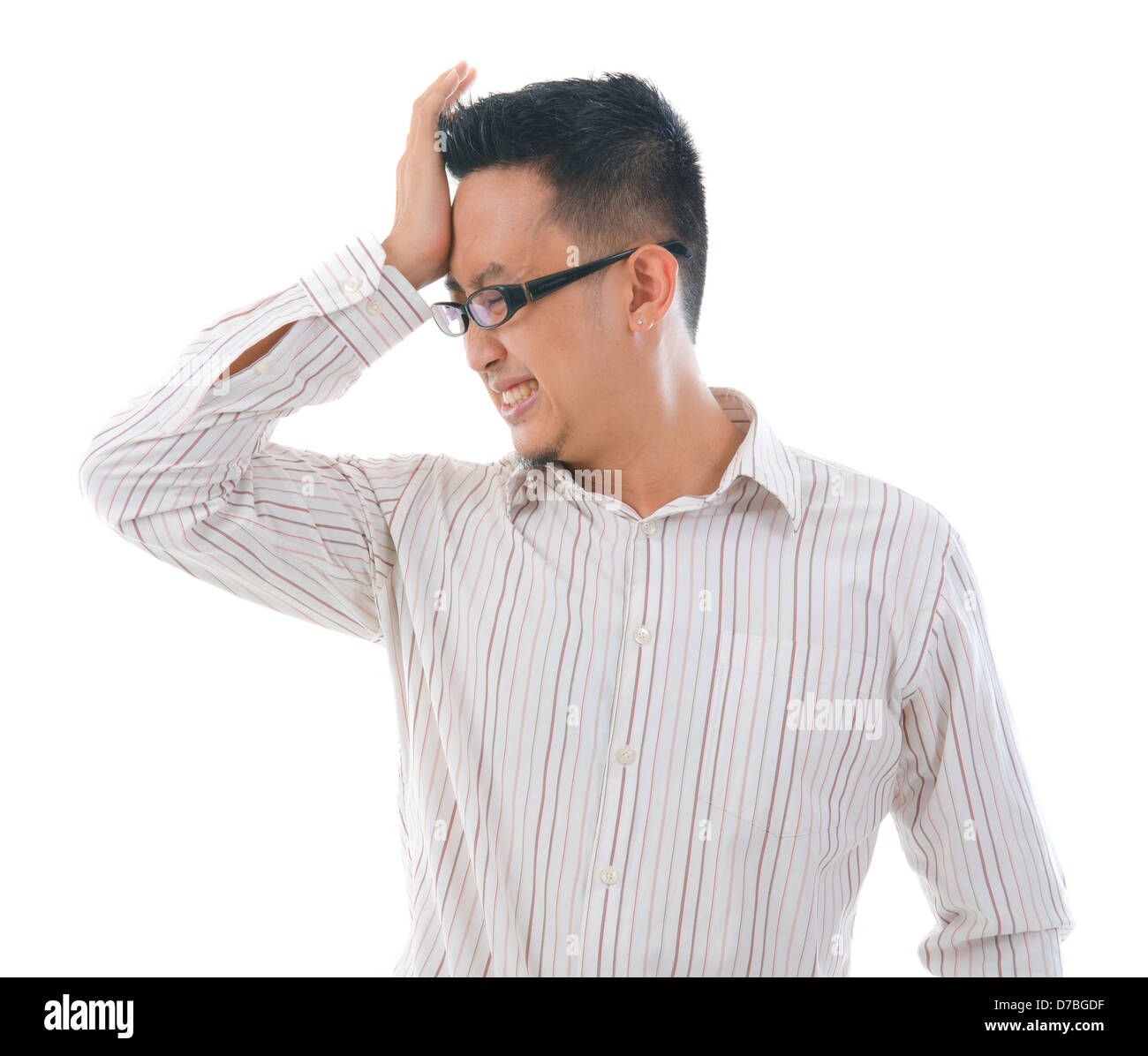 Asian business man holding his head. Conceptual image Stock Photo - Alamy