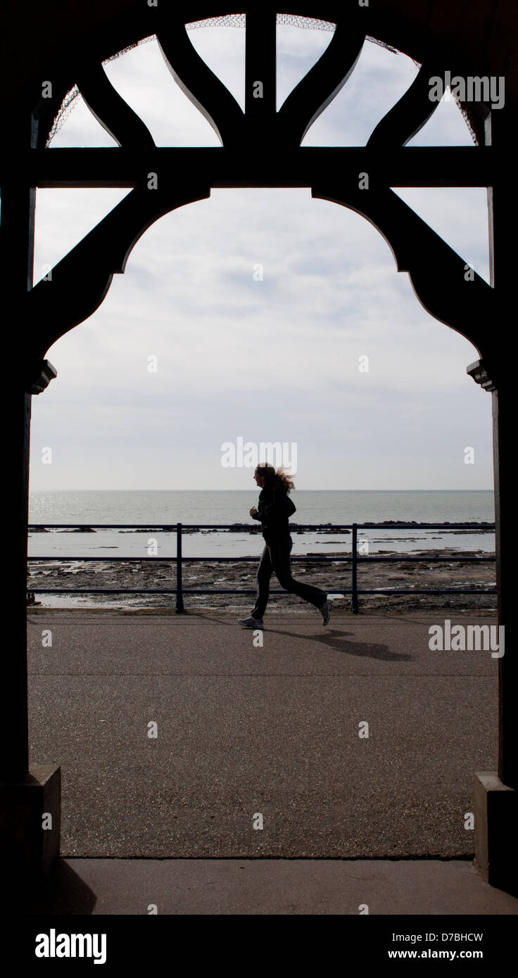 running along seafront Stock Photo - Alamy