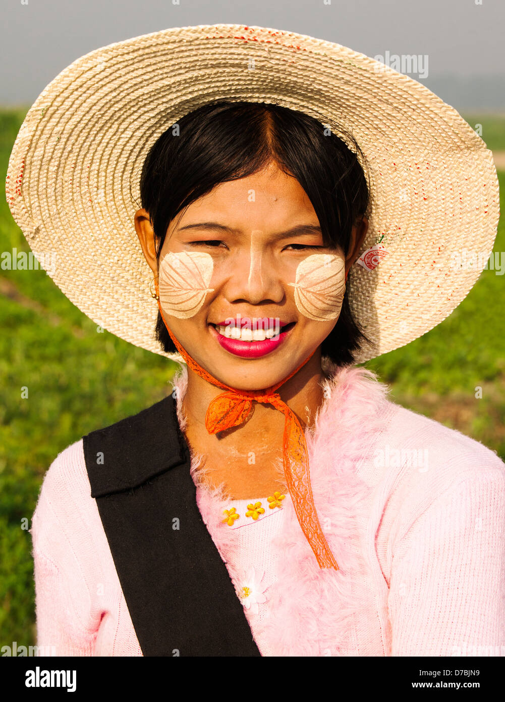 A woman wearing traditional clothes and a hat, Amarapura, Mandalay ...