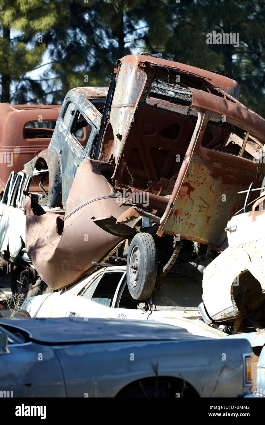 Rusted scrap metal car yard Stock Photo - Alamy