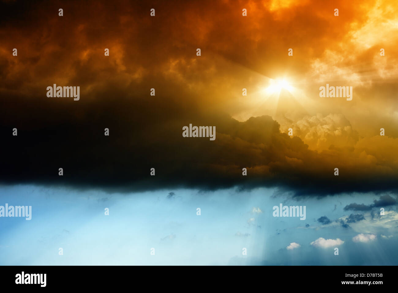 Dark dramatic sky with bright red sun Stock Photo - Alamy