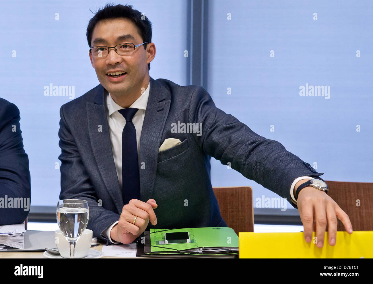 Federal Chairman of the FDP Philipp Roesler sits before the start of ...