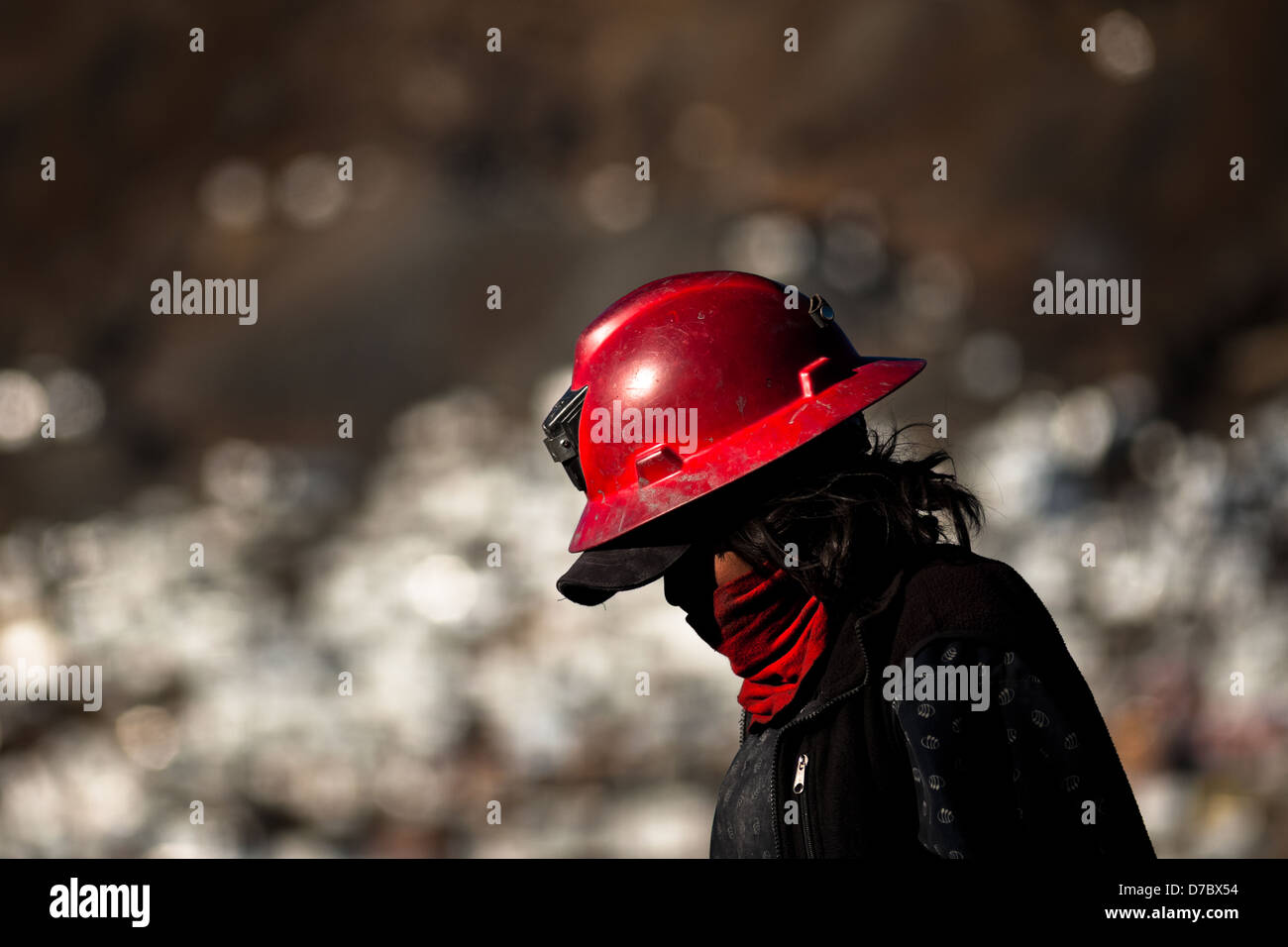 Pallaquera, a female gold miner, walks close to the gold mines in La ...