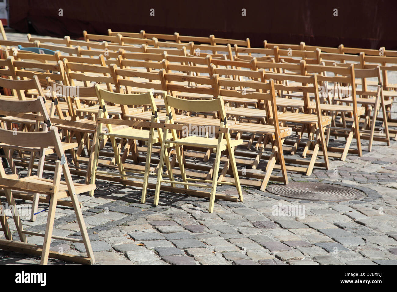 rows of wooden chairs Stock Photo - Alamy