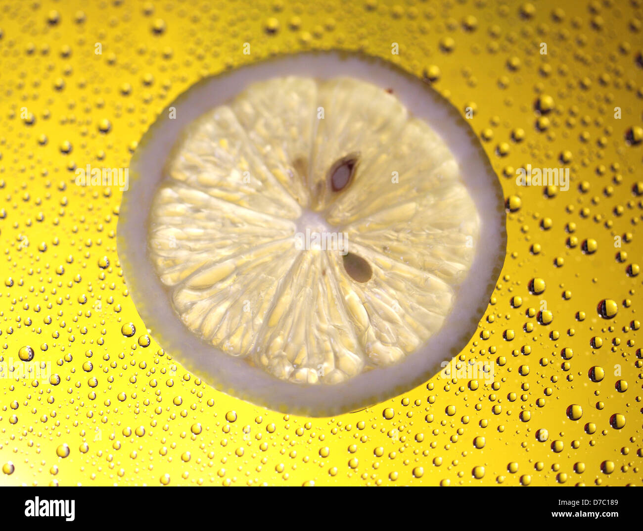 Lemon drops surrounded by water Stock Photo - Alamy