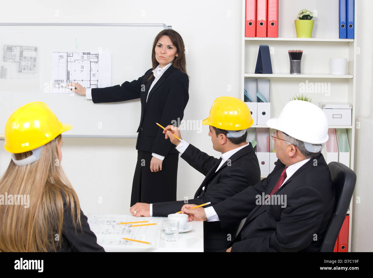 architect giving presentation to a small business group Stock Photo - Alamy