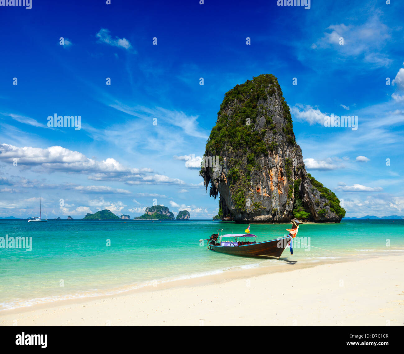 Long tail boats on tropical idyllic beach (Pranang beach), Krabi ...